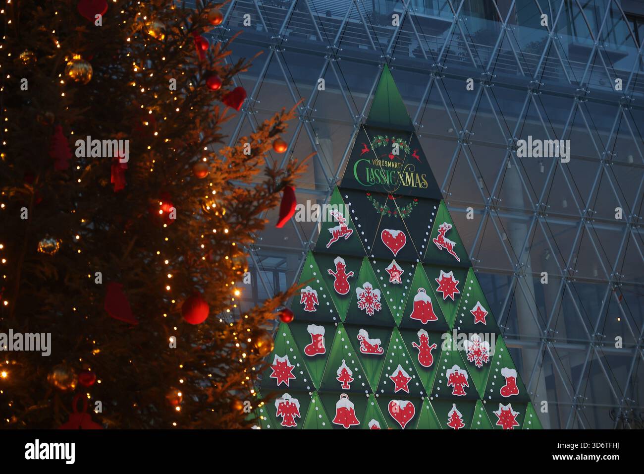 Decorated and illuminated tree in front of Vörösmarty Classic Xmas ...