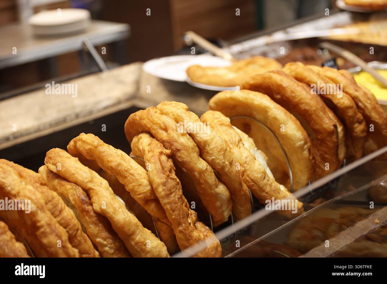 Freshly fried traditional Hungarian street food lángos (deep fried ...
