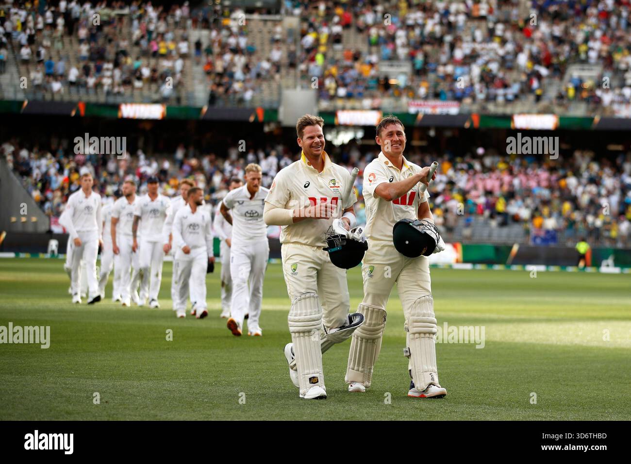 Australia's captain Steve Smith, left, and Marnus Labuschagne leave teh ...