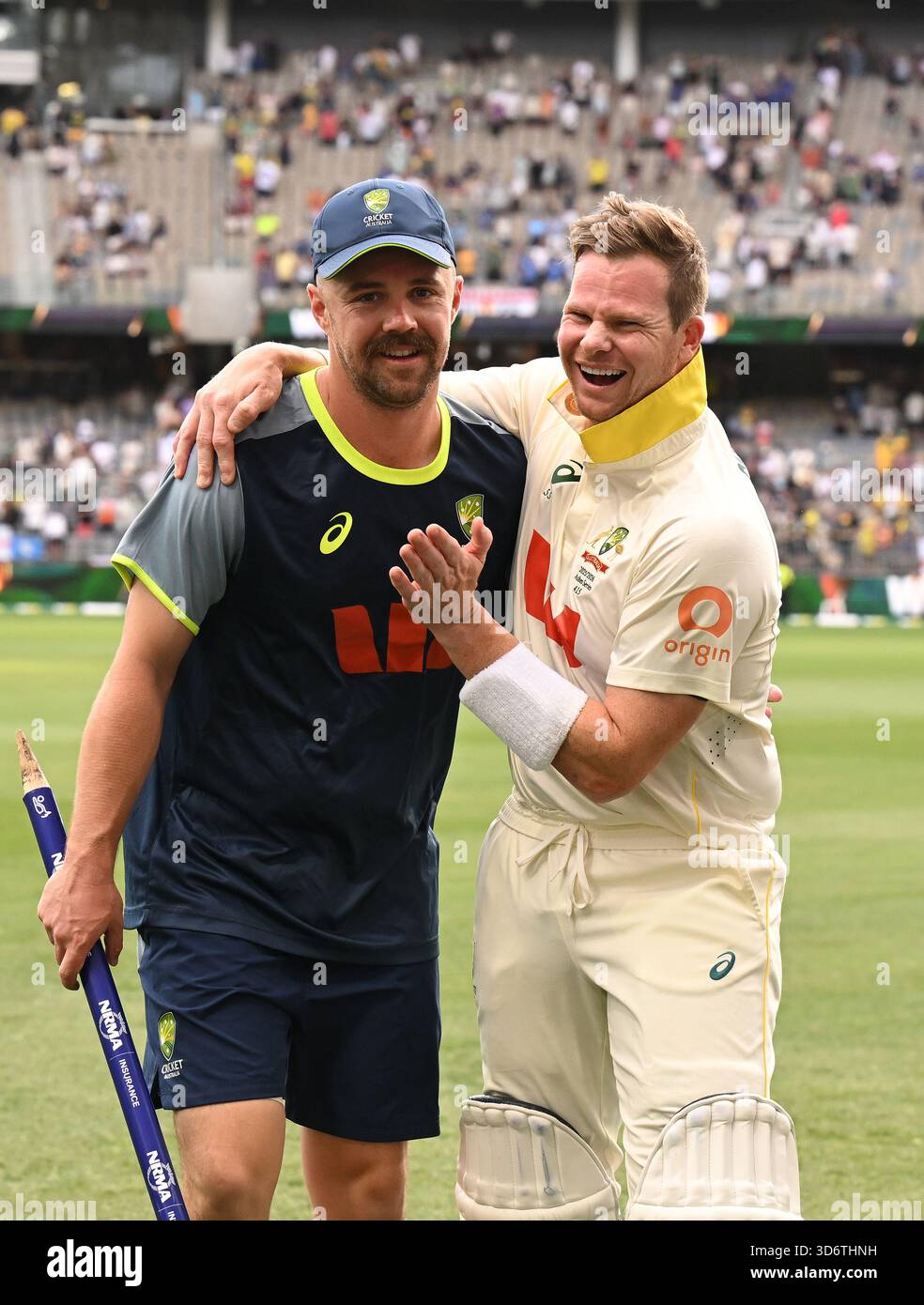 Australian captain Steve Smith reacts with Travis Head (l) following ...