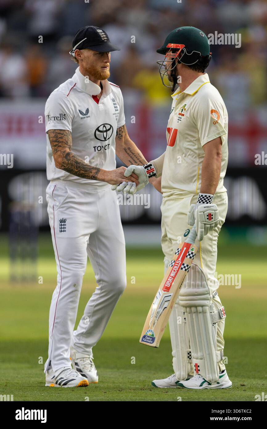 Travis Head of Australia is congratulated by Ben Stokes (c) of England ...