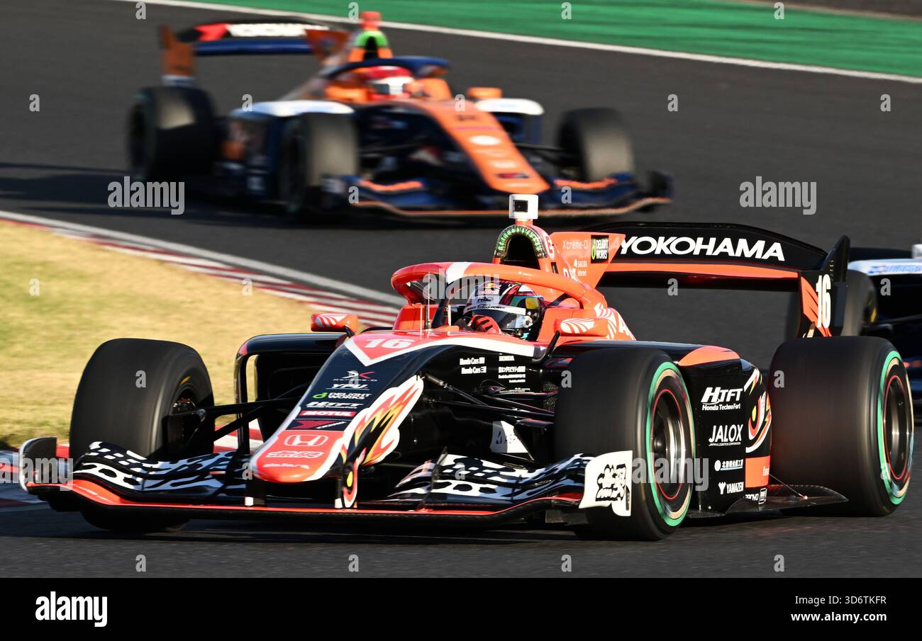 The cars compete during the Rd.11 final race of Super Formula at Suzuka Circuit in Suzuka City ...