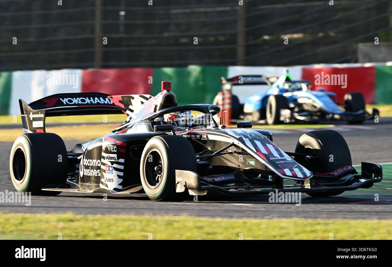 The cars compete during the Rd.11 final race of Super Formula at Suzuka Circuit in Suzuka City ...
