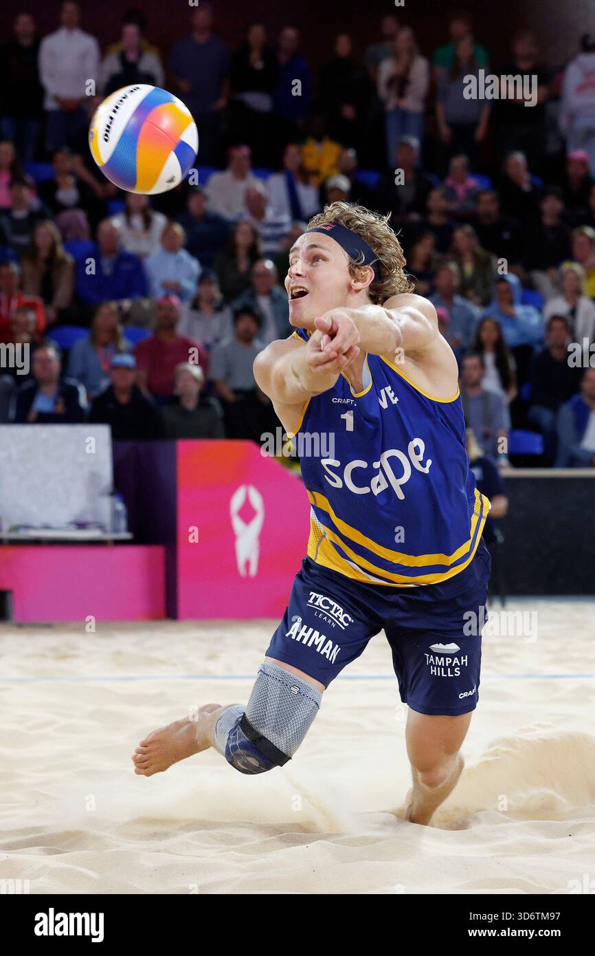 David Åhman of Sweden dives for the ball in the men's semifinal against ...