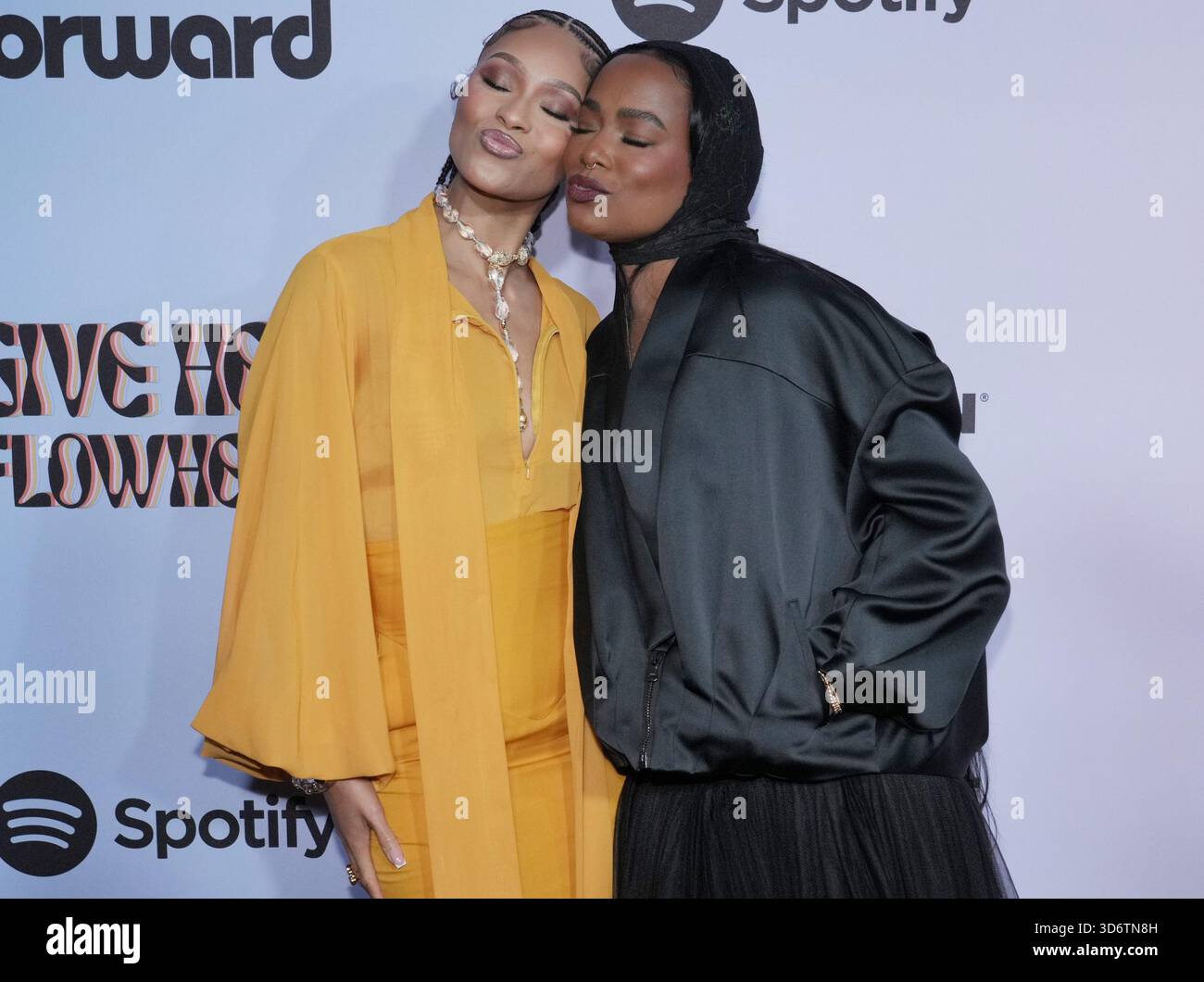 (L-R) Pretty Vee and Heather Lowery arrives at the Give Her FlowHERS ...