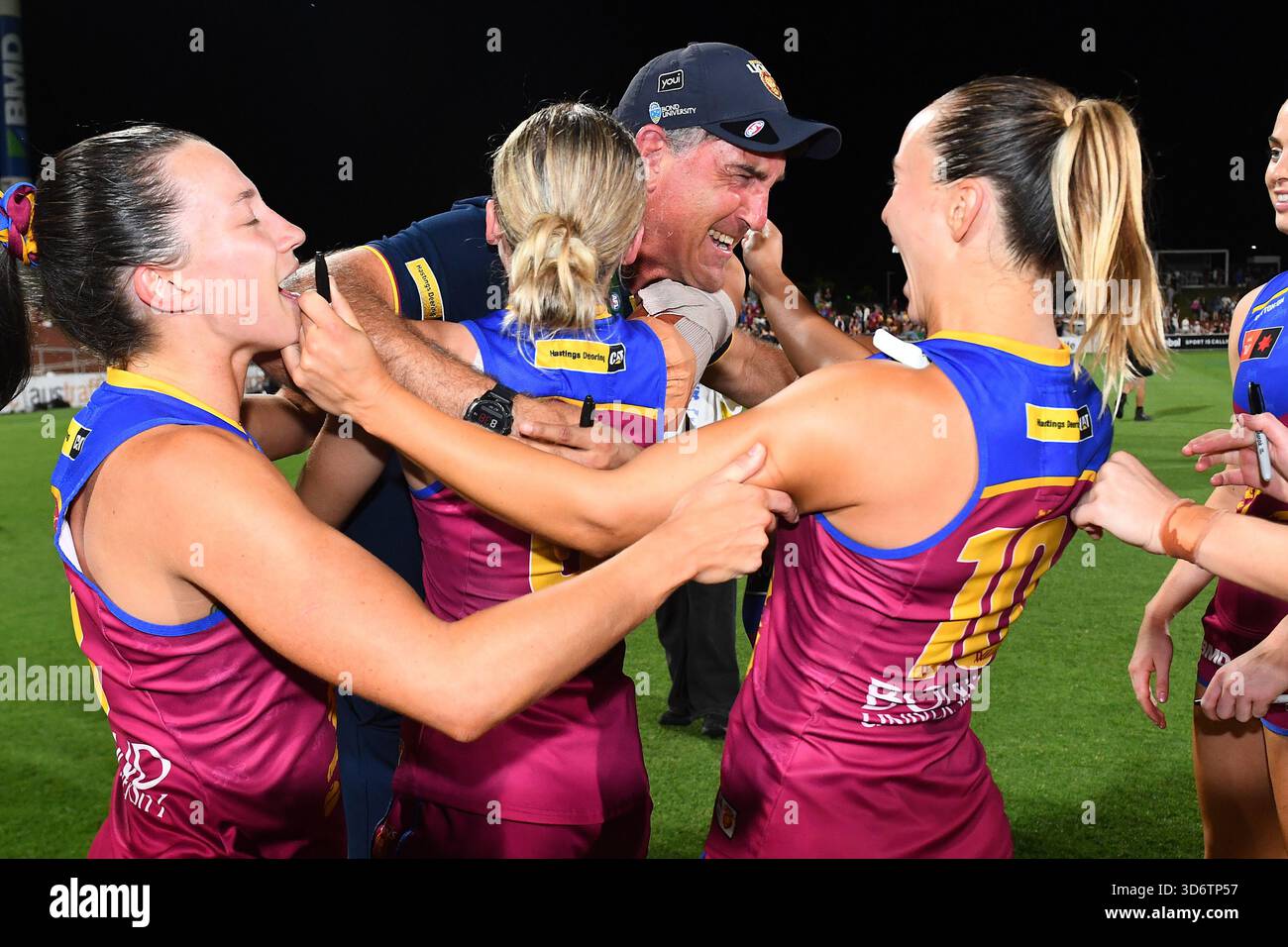 Lions coach Craig Starcevich celebrates with his team after winning the ...