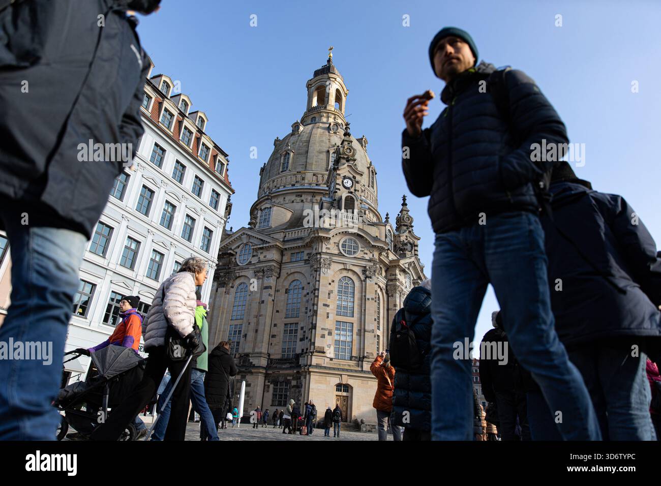 On a cold Saturday, November 22, 2025, people walked near the ...