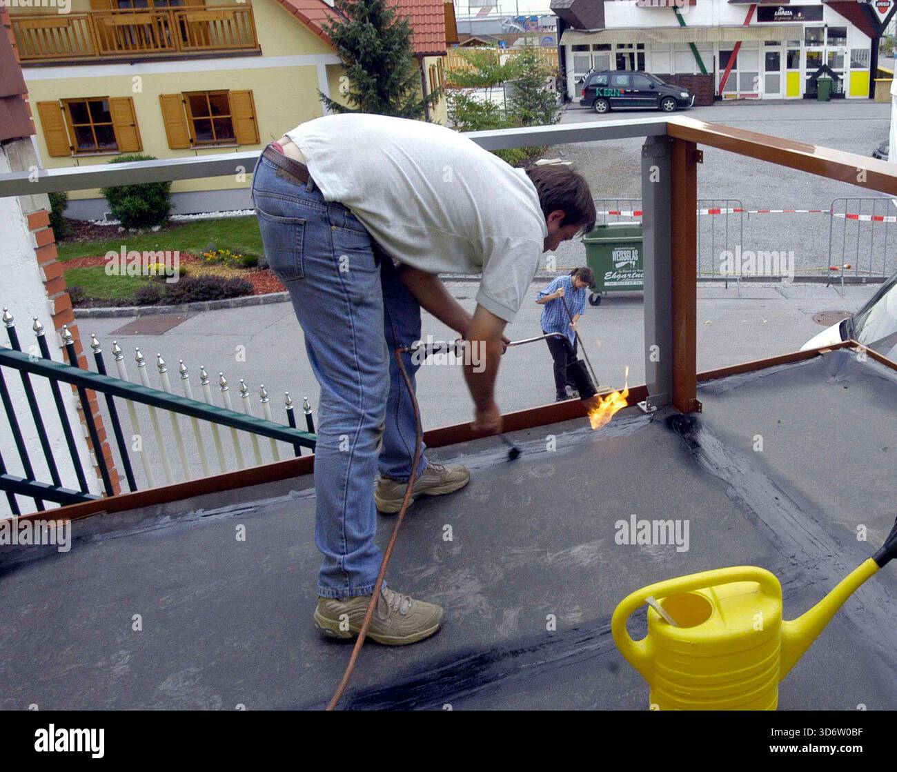 a blackdecker sealing or waterproofing a roof to prevent damage ...