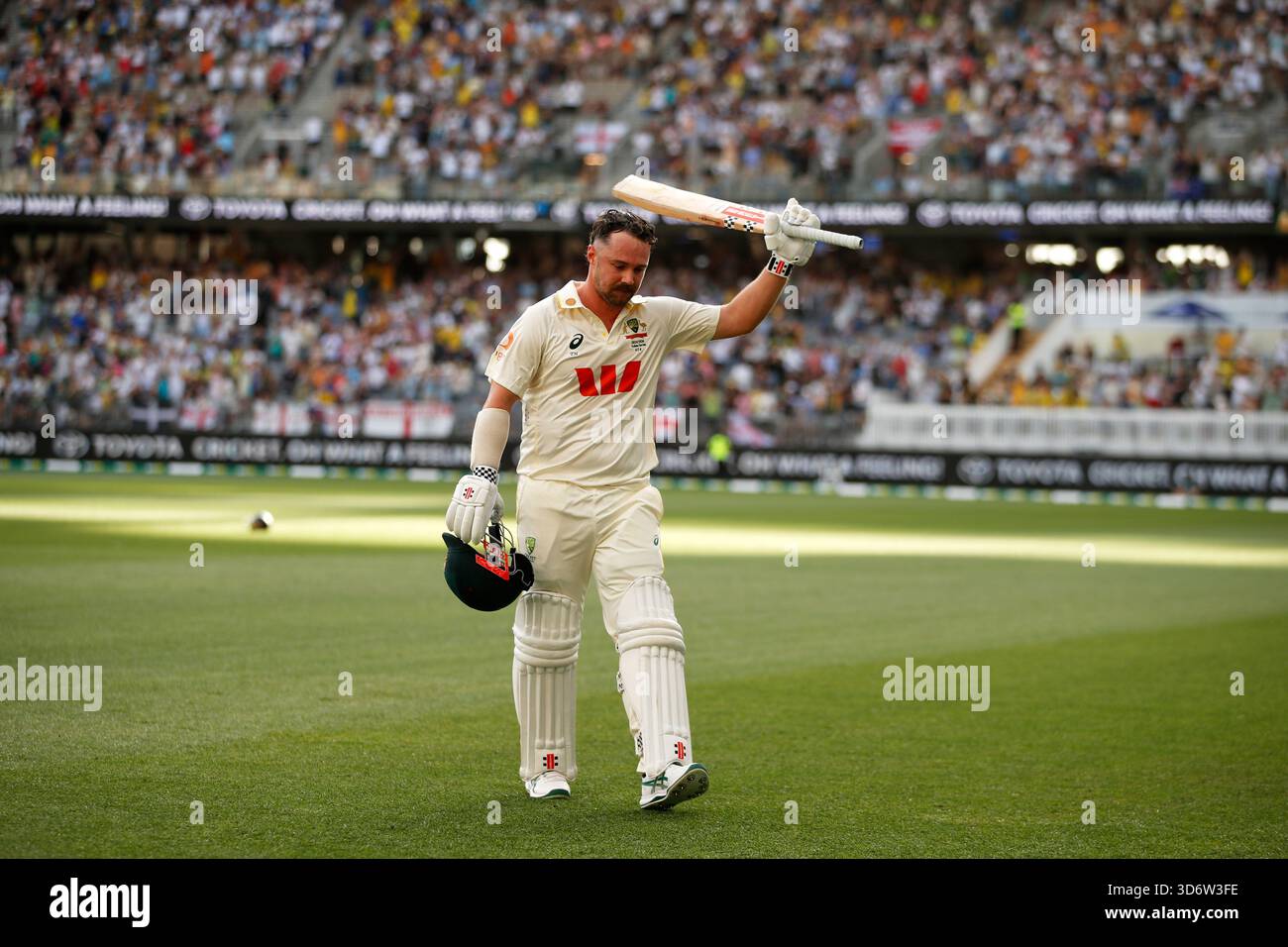 Australia's Travis Head acknowledges the applause as he leaves the ...