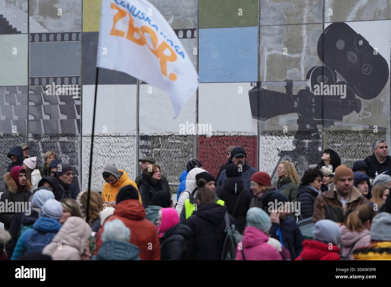 People attend a student-led march marking one year since a physically ...
