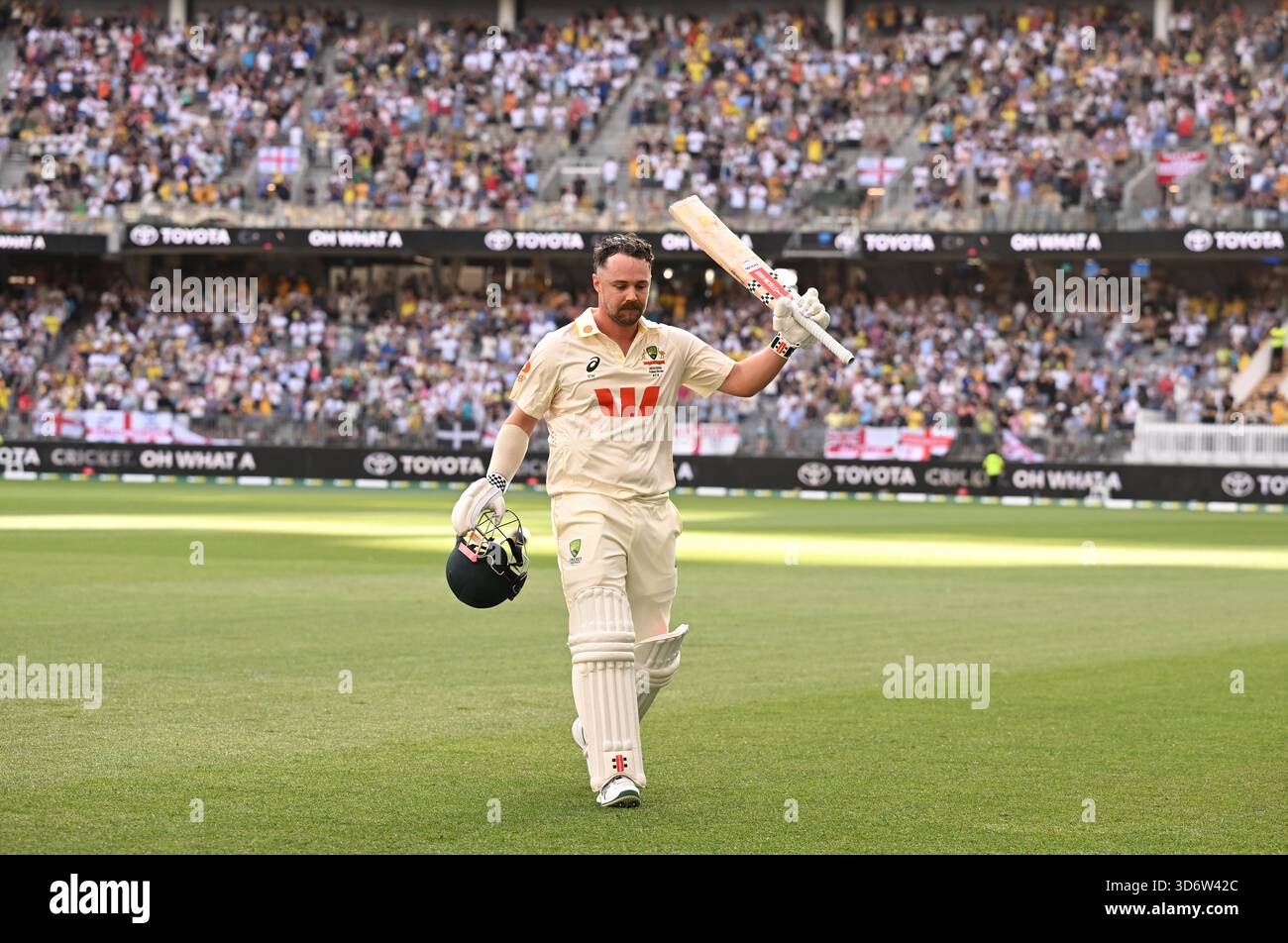 Australian batsman Travis Head reacts to crowd applause as he leaves ...