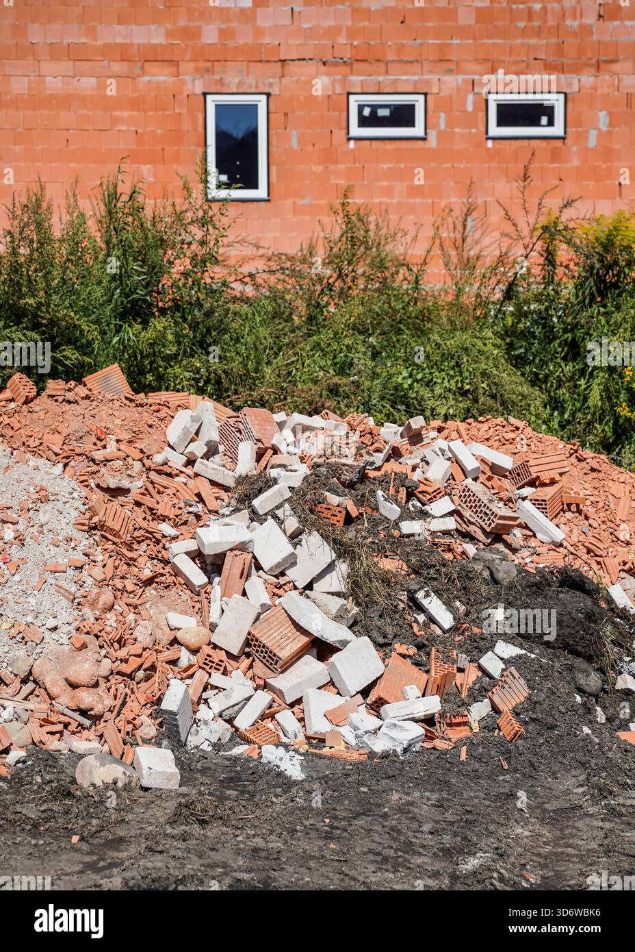 Heap of construction debris - broken pieces of bricks and concrete ...