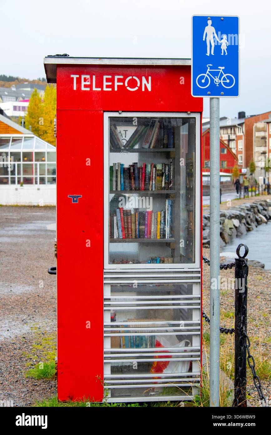 Harstad, Norway - October 4, 2024: Red telephone booth transformed into ...