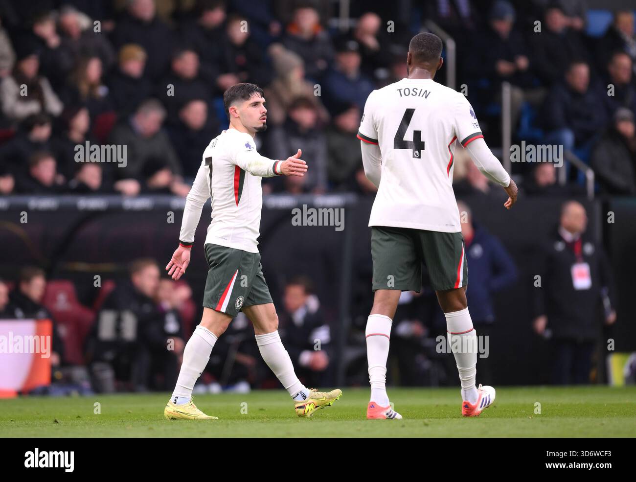 Chelsea's Pedro Neto (left) celebrates scoring their side's first goal ...