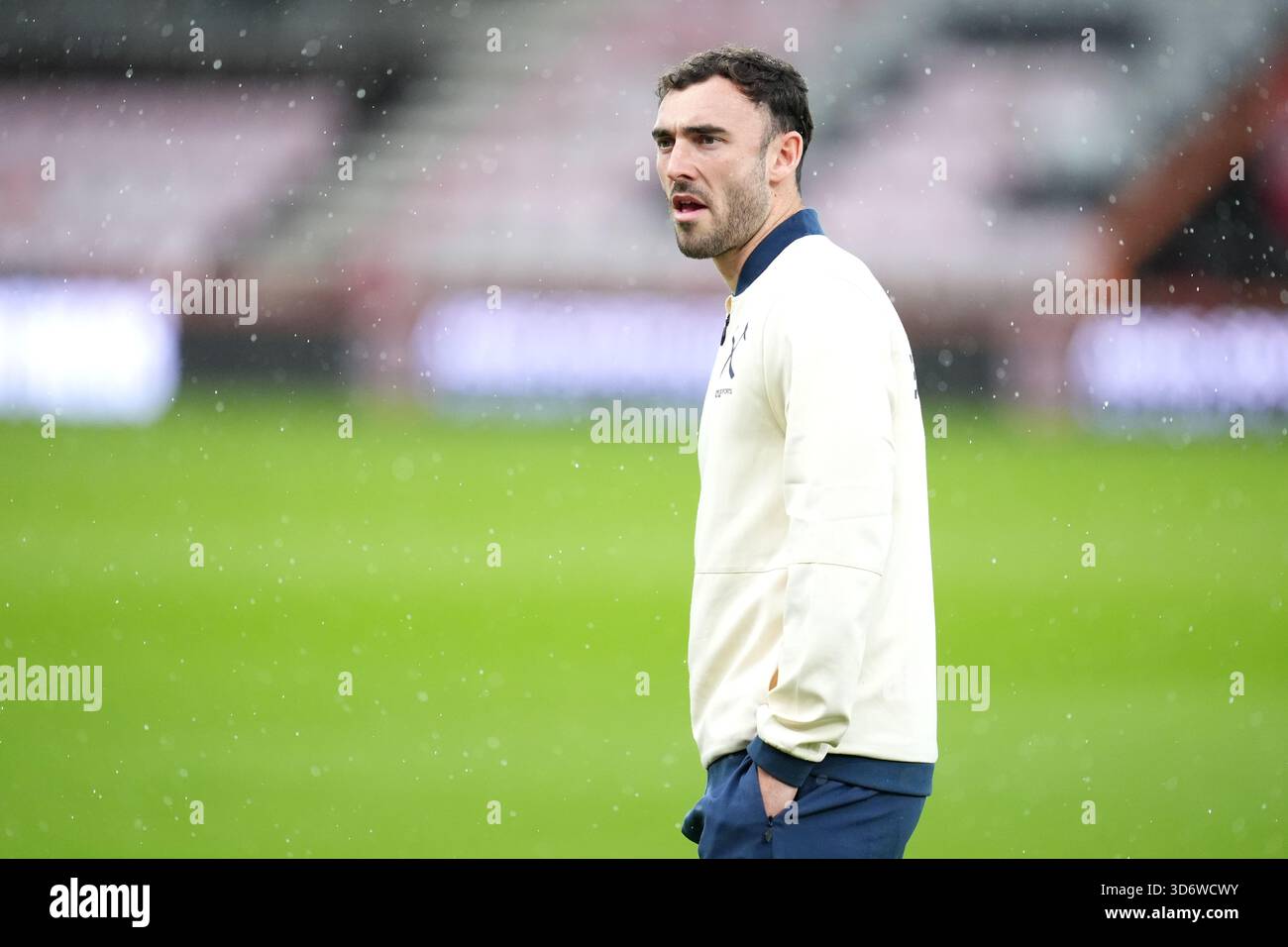 West Ham United's Andy Irving inspects the pitch before the Premier ...