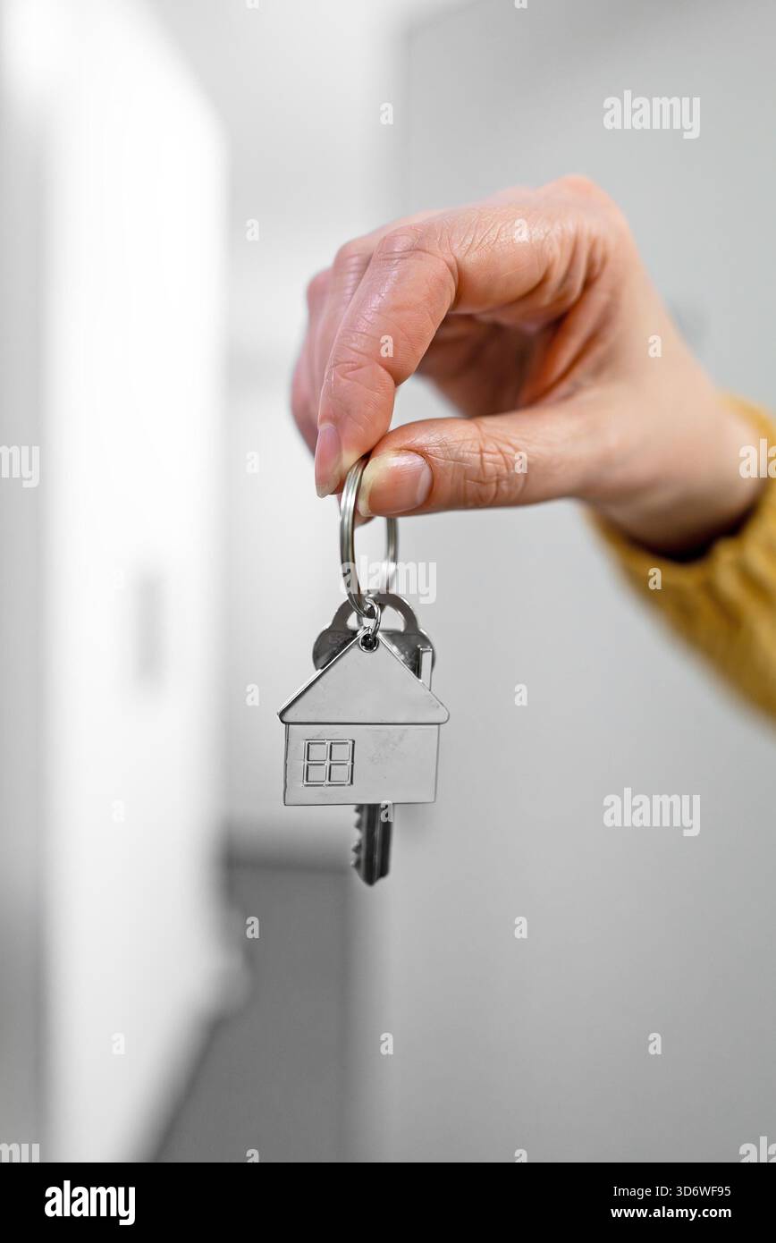 Woman key door character hi-res stock photography and images - Alamy