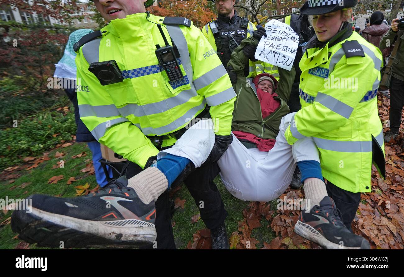 Police remove people from the Defend Our Juries protest in support of ...