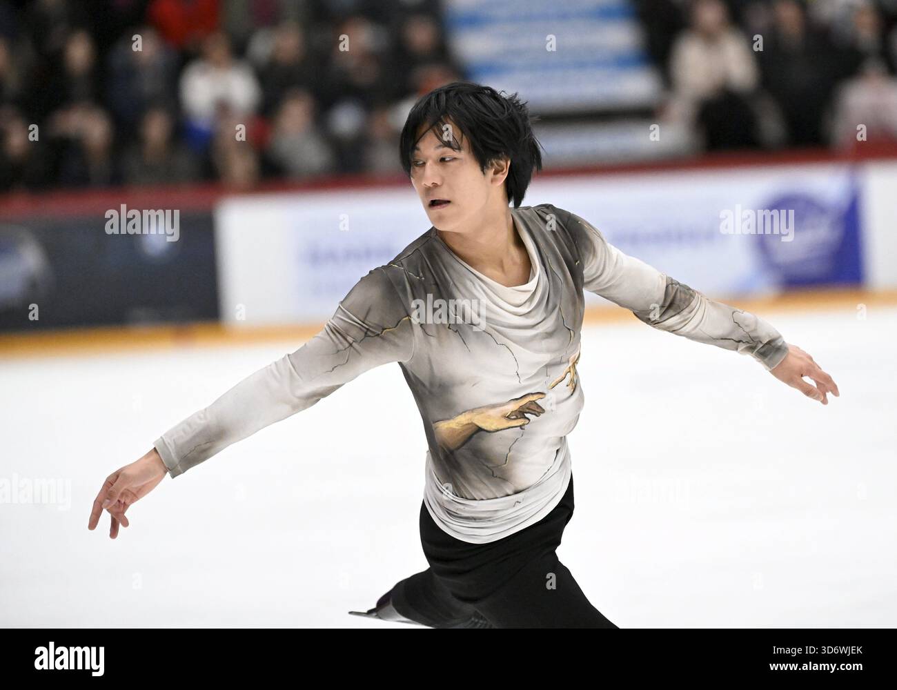Adam Siao Him Fa of France performs in Men's free skating Program ...