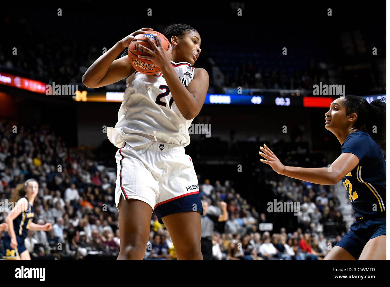 UConn forward Sarah Strong (21) grabs a rebound in the second half of ...