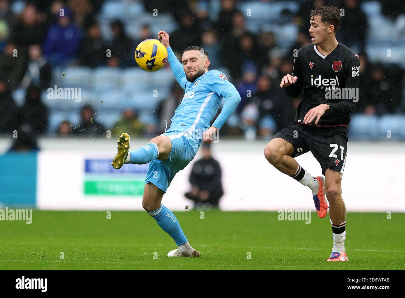 Coventry City's Matt Grimes (left) and West Bromwich Albion's Isaac ...