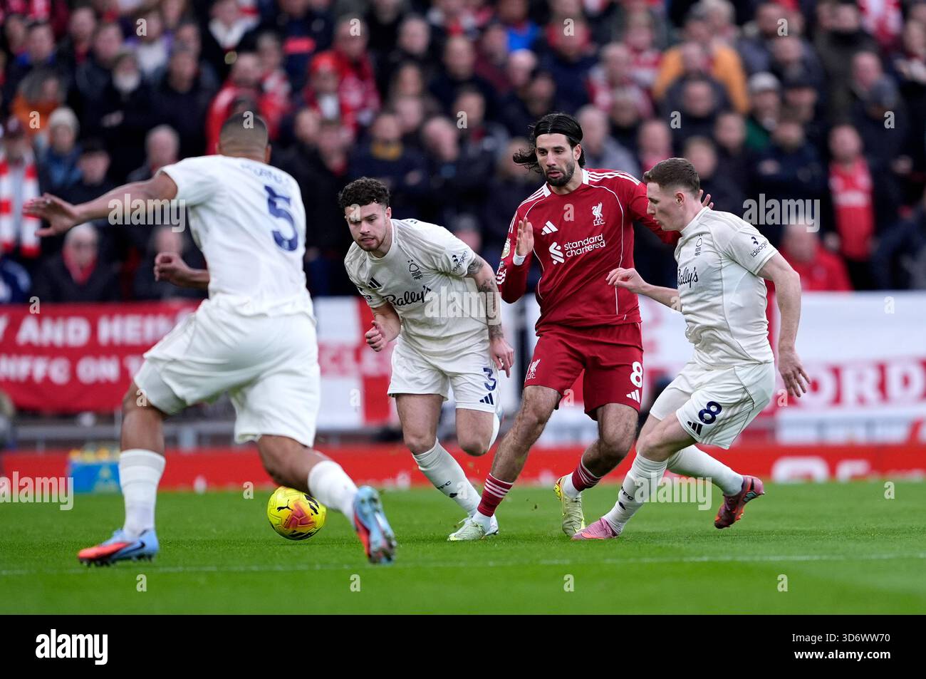 Liverpool's Dominik Szoboszlai (second right) battles with Nottingham ...