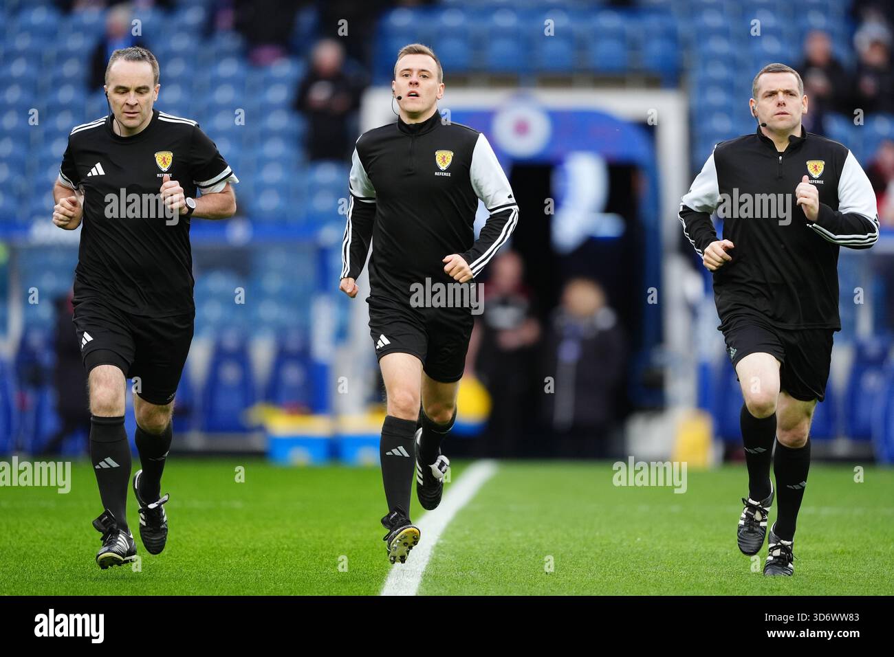 Referee Ross Hardie (centre) and match official Douglas Ross MSP (right ...