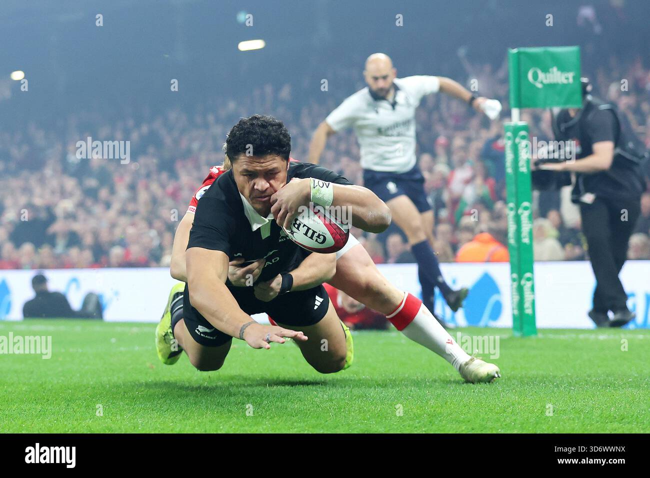 New Zealand's Caleb Clarke scores a try during the Quilter Nations ...