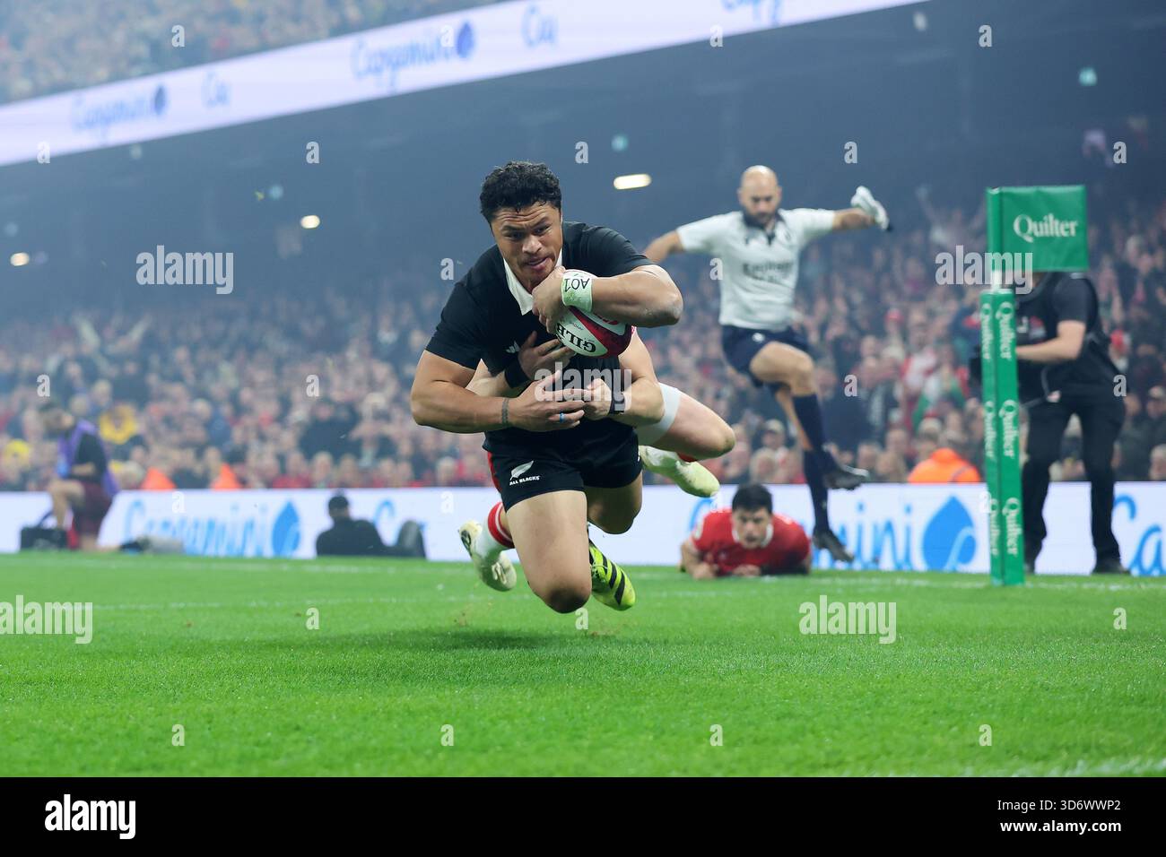 New Zealand's Caleb Clarke scores a try during the Quilter Nations ...