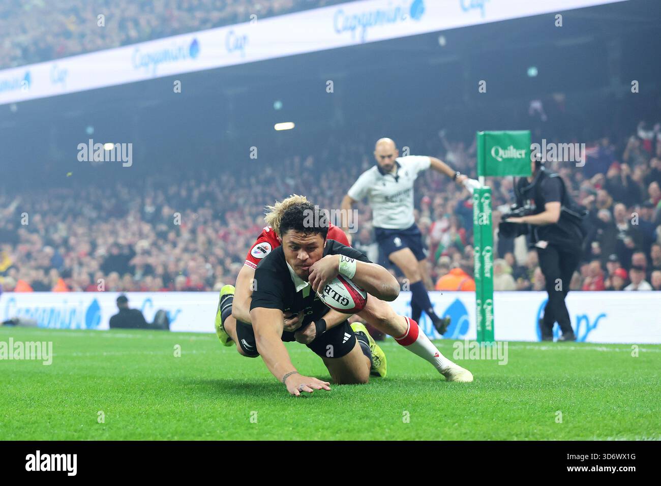 New Zealand's Caleb Clarke scores a try during the Quilter Nations ...