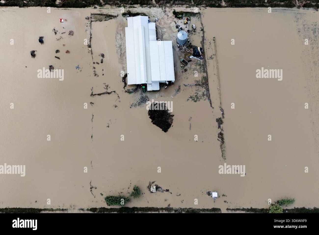 A flooded farm is seen from above after a week of torrential rains in ...