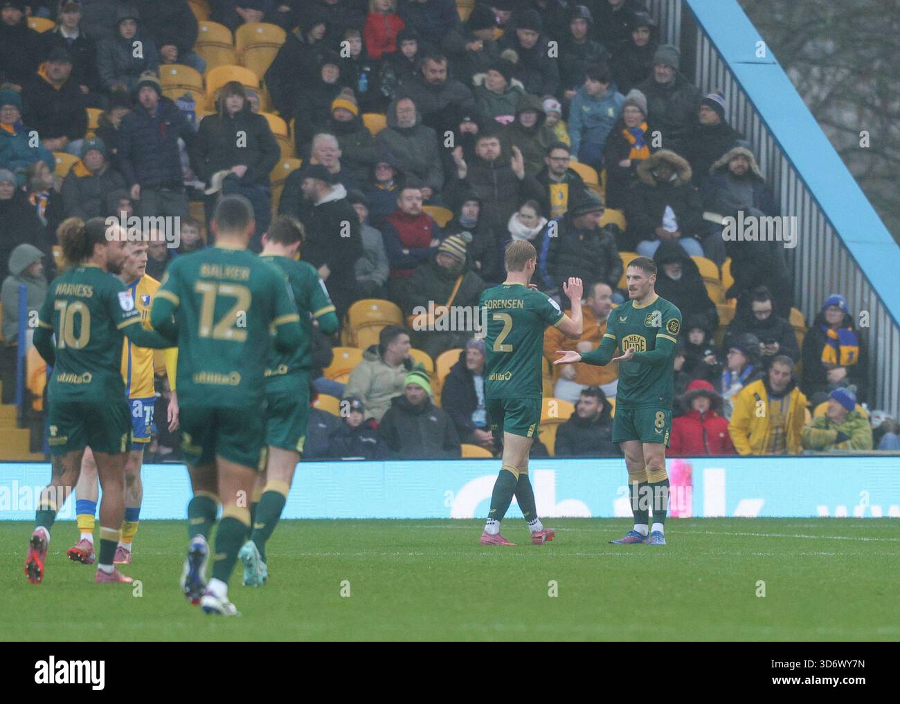 Ben Wiles of Huddersfield Town celebrates his goal to make it 0-3 ...