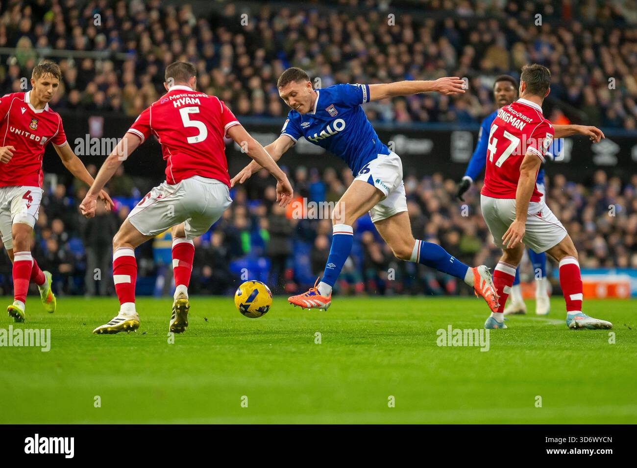 Dara O'Shea of Ipswich Town and Ryan Longman of Wrexham battle for the ...