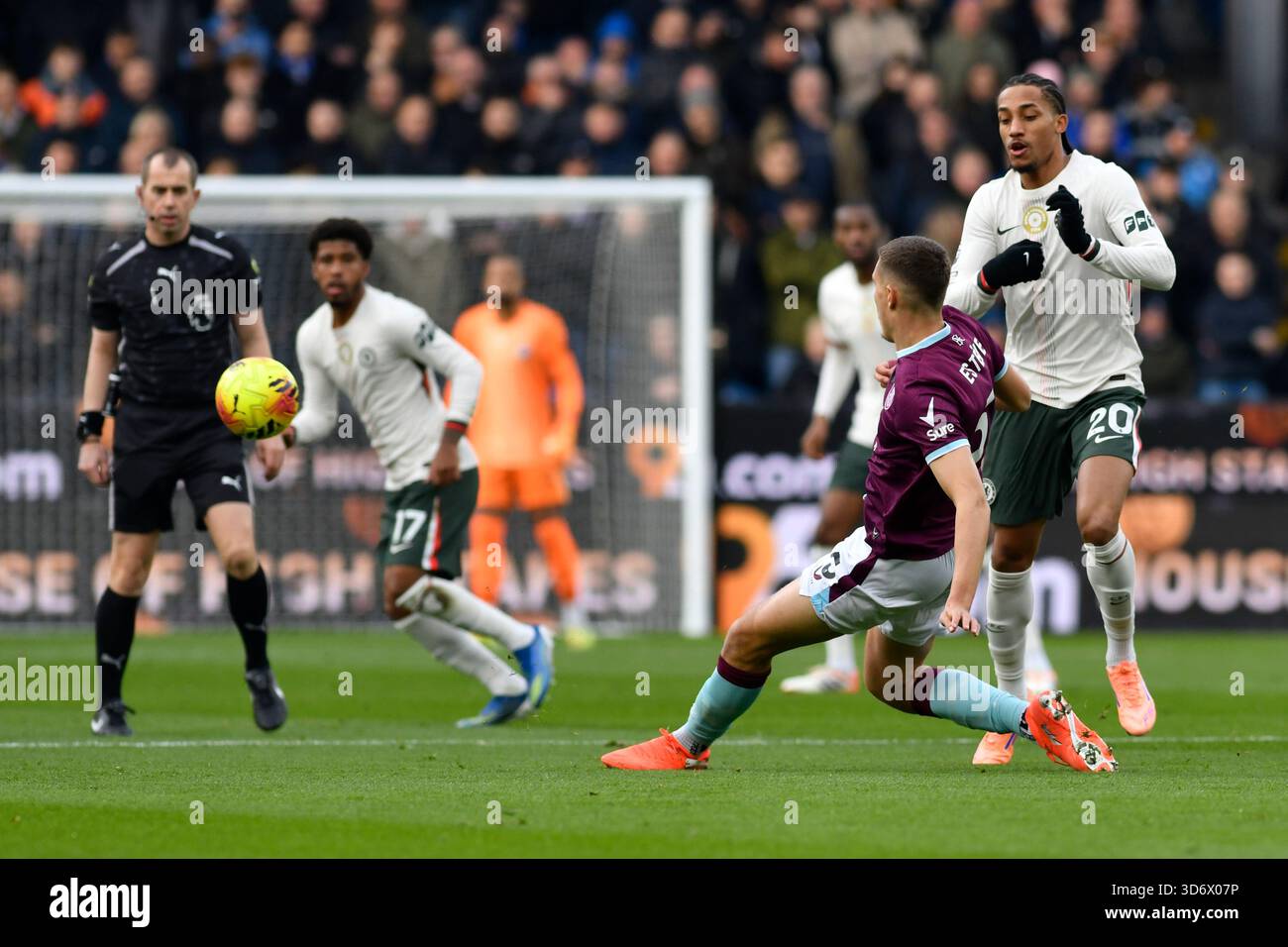 Maxime Estève of Burnley tackles João Pedro of Chelsea during the ...