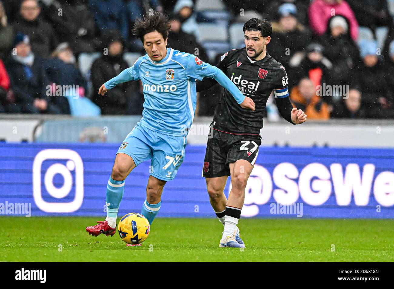 Tatsuhiro Sakamoto (7 Coventry City) challenged by Alex Mowatt (27 West ...