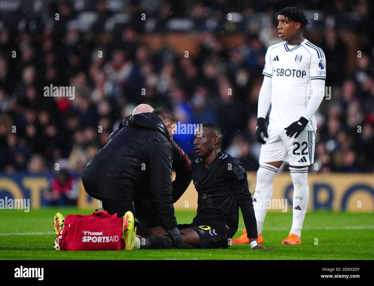 Sunderland's Nordi Mukiele receives treatment during the Premier League ...