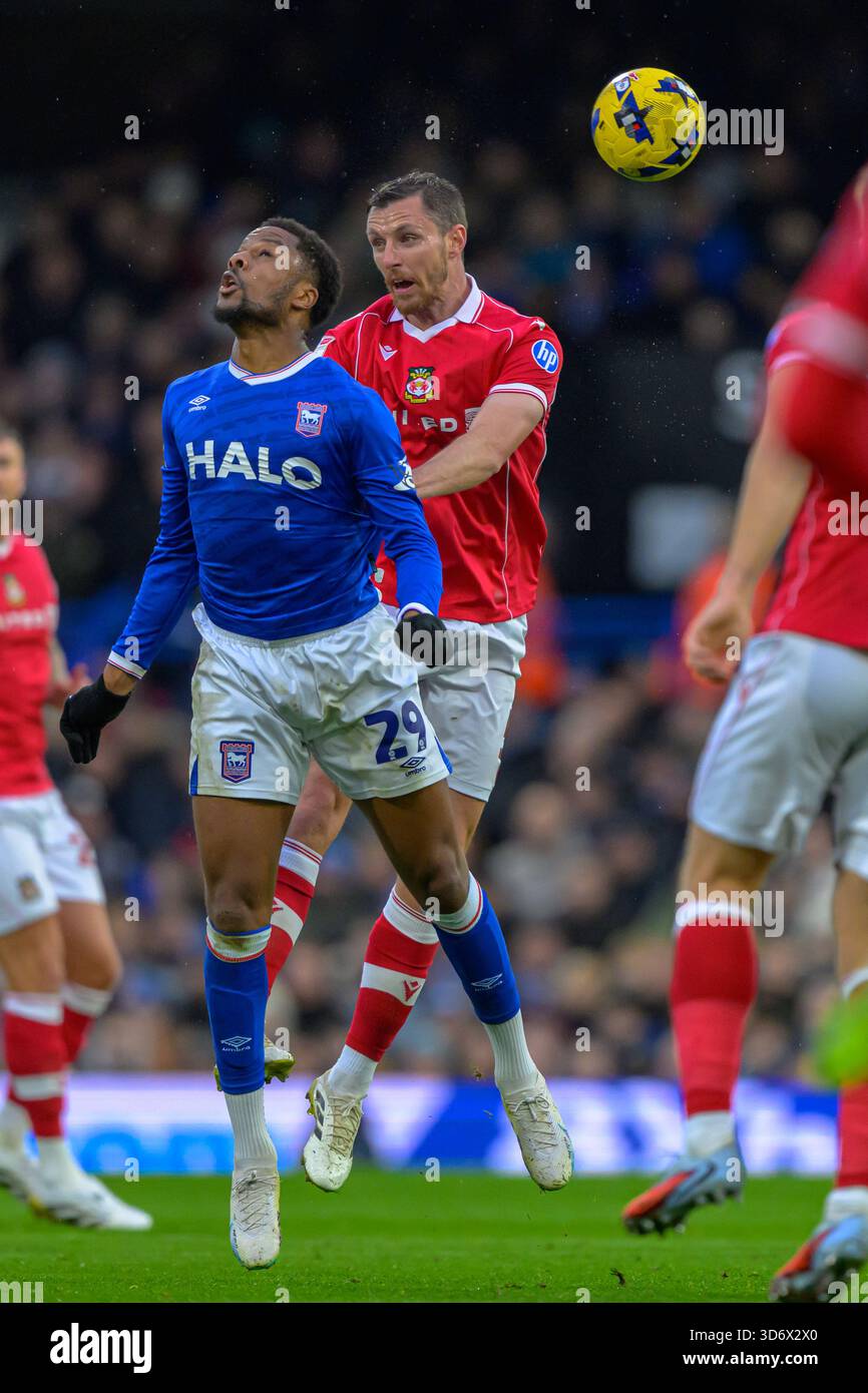 Chuba Akpom (29 Ipswich Town) under pressure from Dan Scarr (24 Wrexham AFC) during the Sky Bet ...