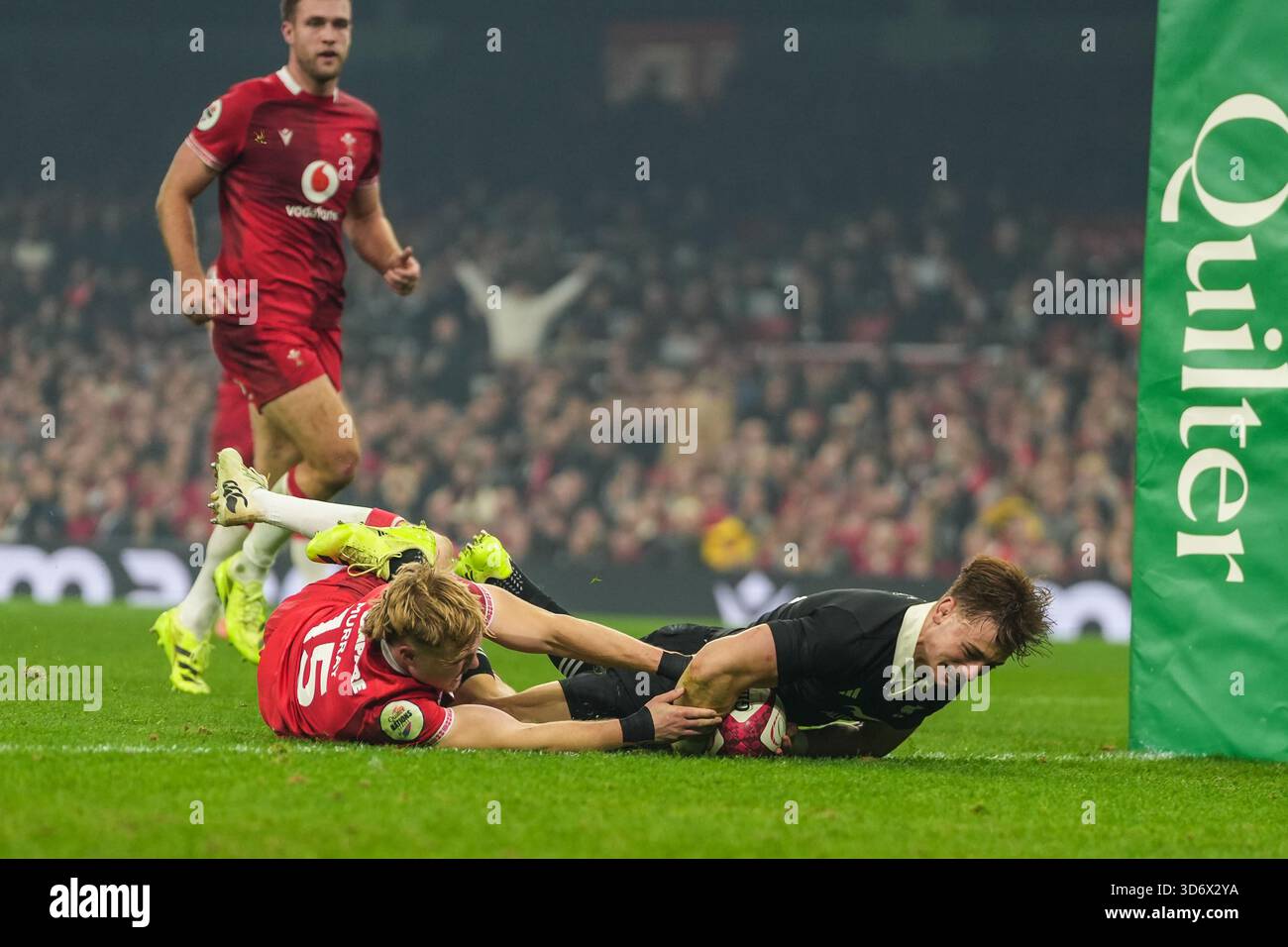 Ruben Love of New Zealand scores a try for his team during the Quilter ...