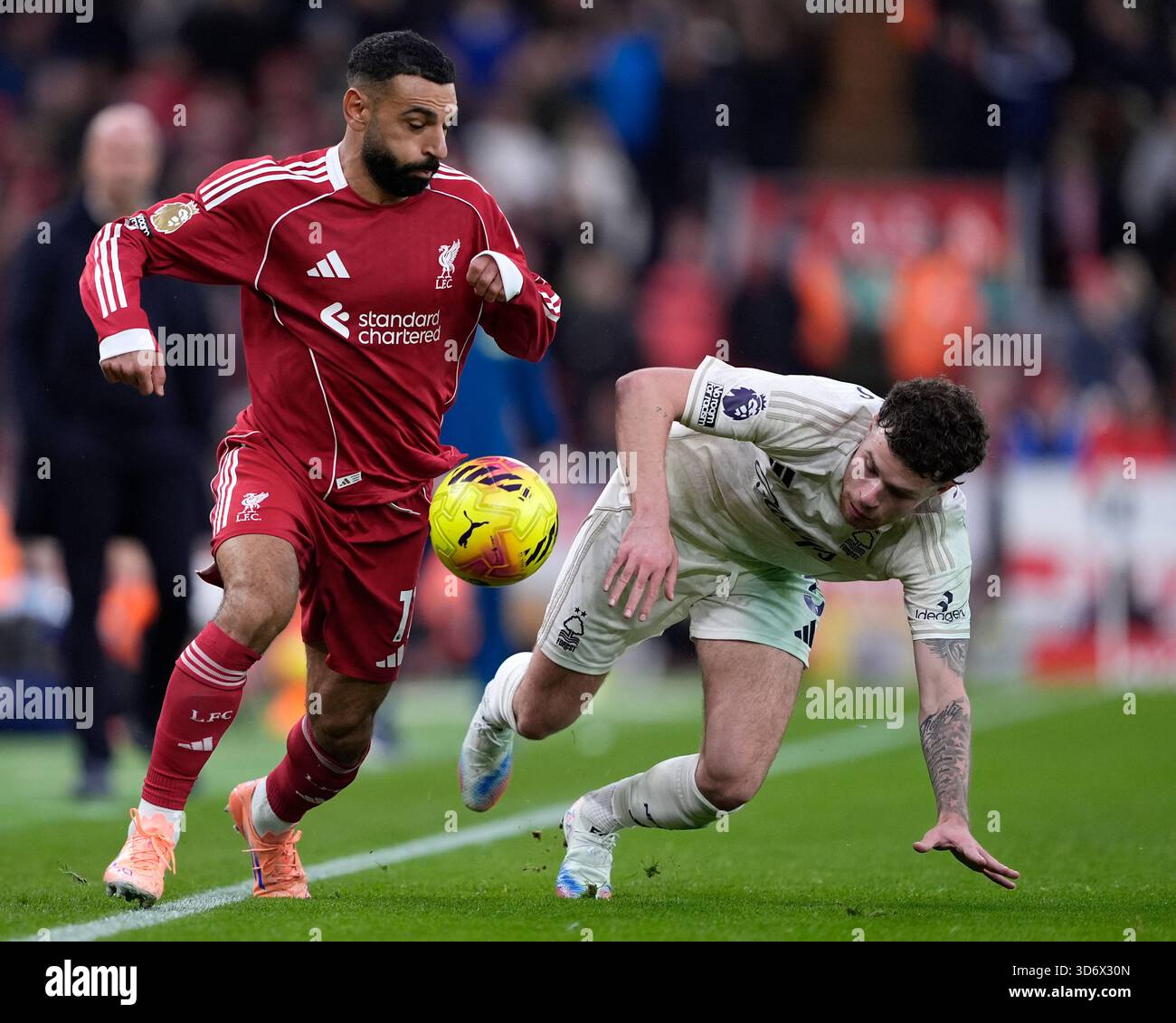 Liverpool's Mohamed Salah (left) and Nottingham Forest's Neco Williams ...