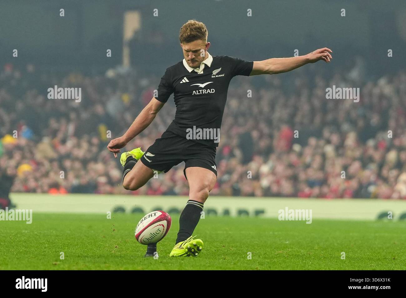 Damian McKenzie of New Zealand kicks a conversion during the Quilter ...