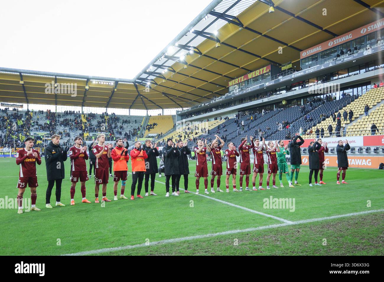 Regensburg celebrates the victory with its fans [supporters] -- DFL ...
