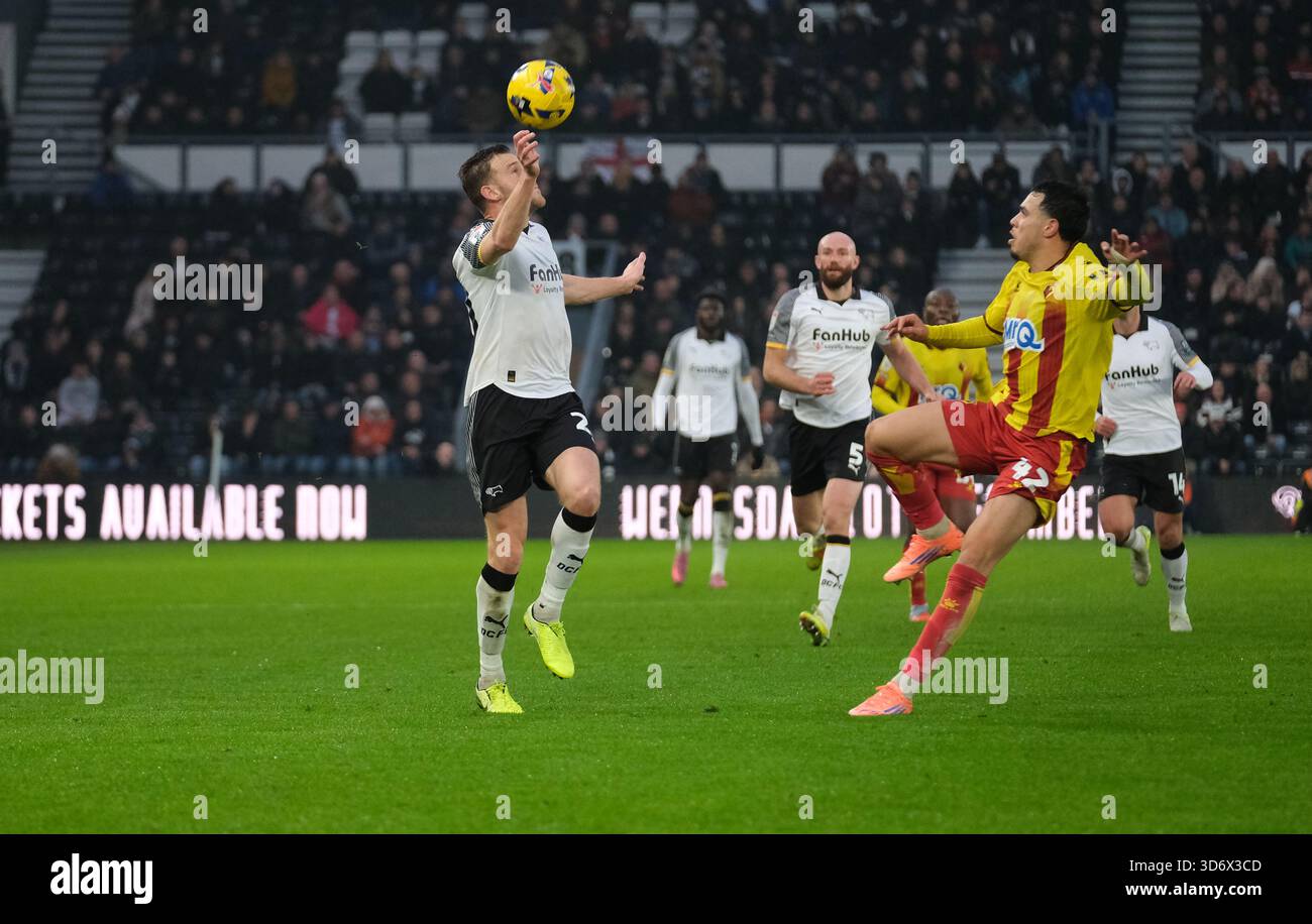 Callum Elder of Derby County heads clear during the EFL Championship ...