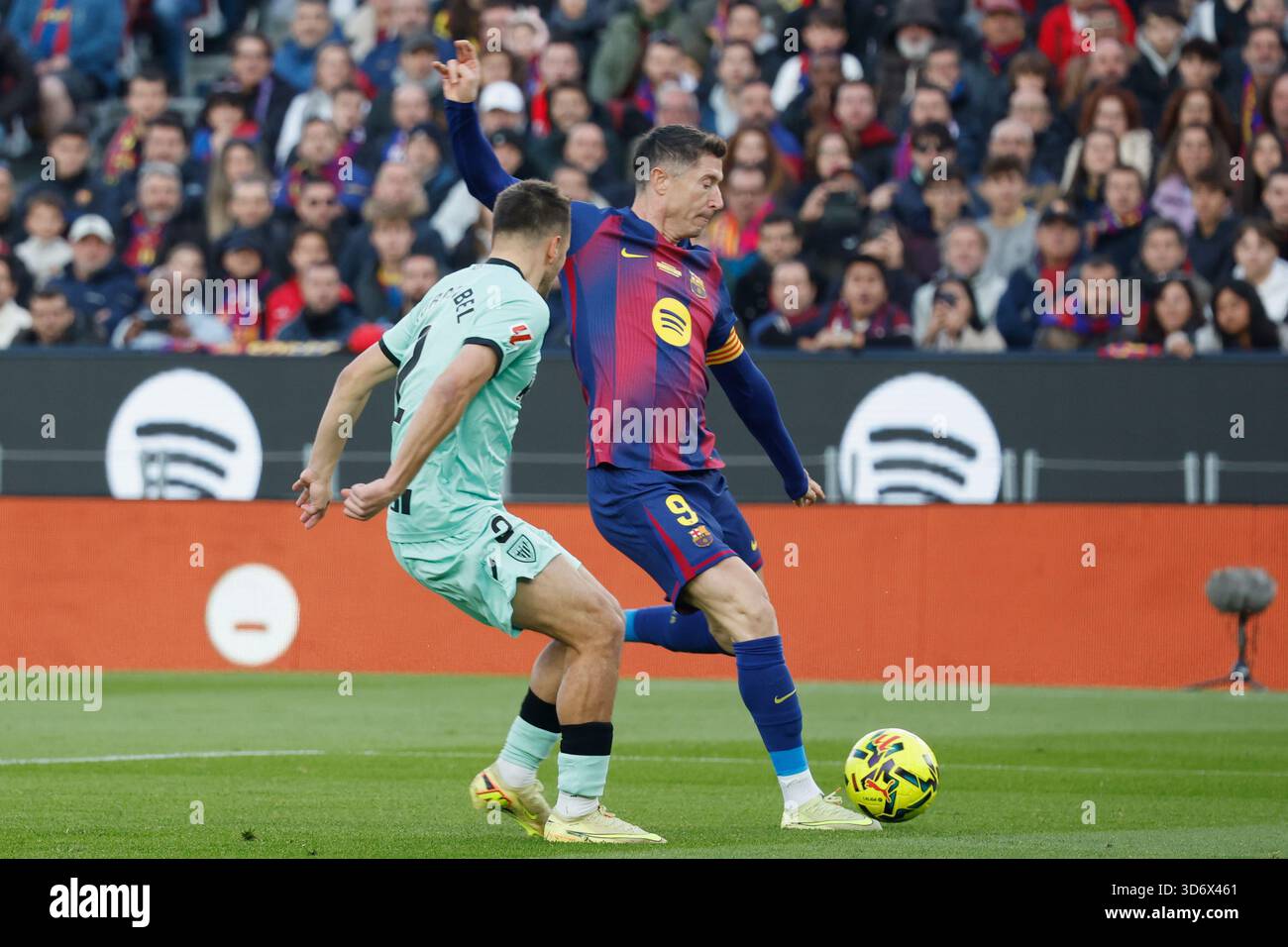 Barcelona's Robert Lewandowski scores during a La Liga soccer match ...