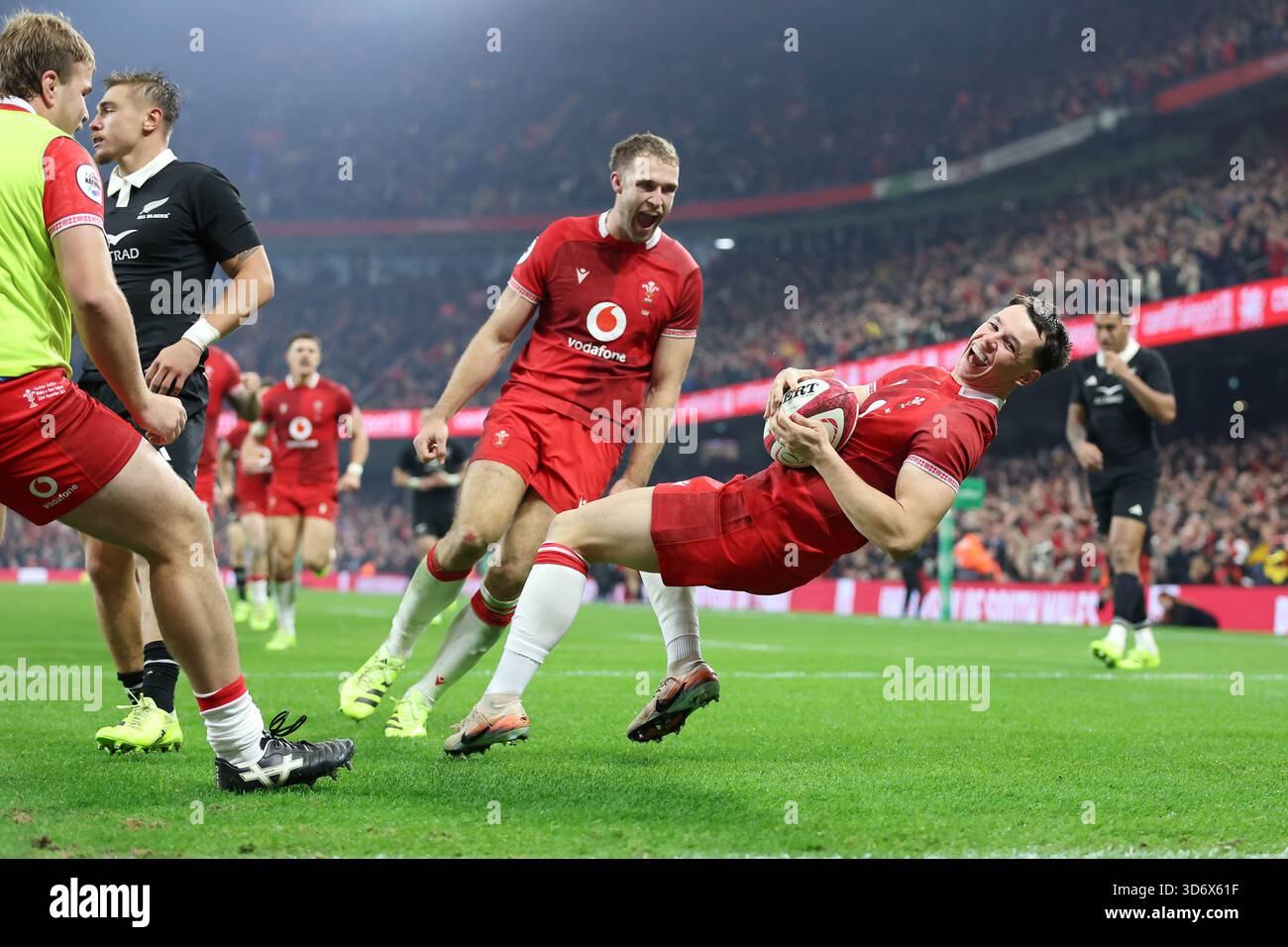 Wales' Tom Rogers celebrates scoring his third try during the Quilter ...