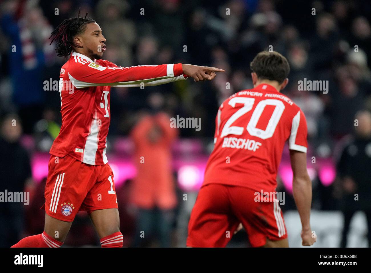 Bayern's Michael Olise celebrates scoring his side's sixth goal during ...