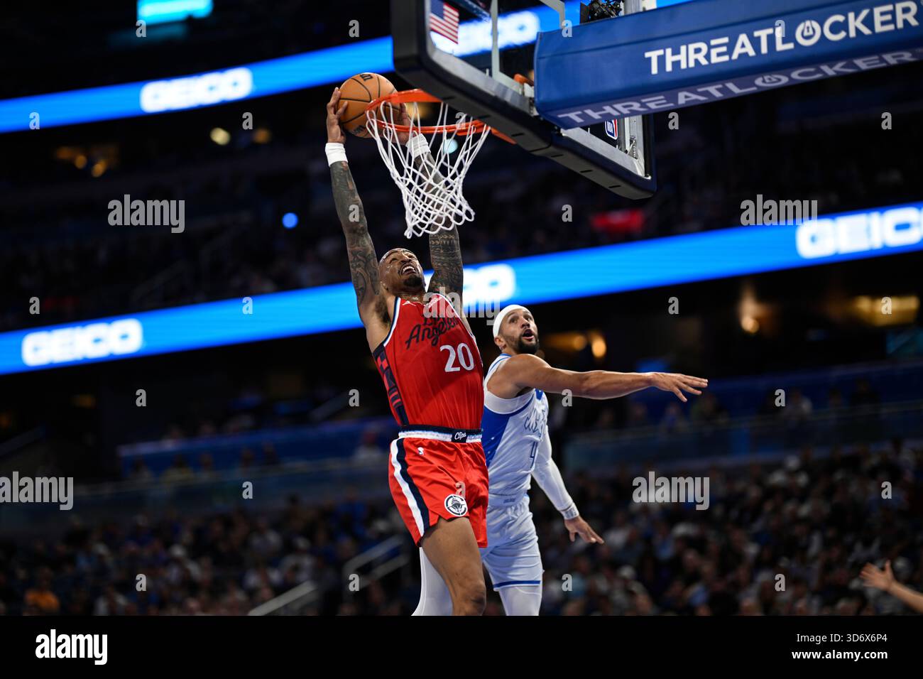 Los Angeles Clippers forward John Collins (20) dunks in front of ...