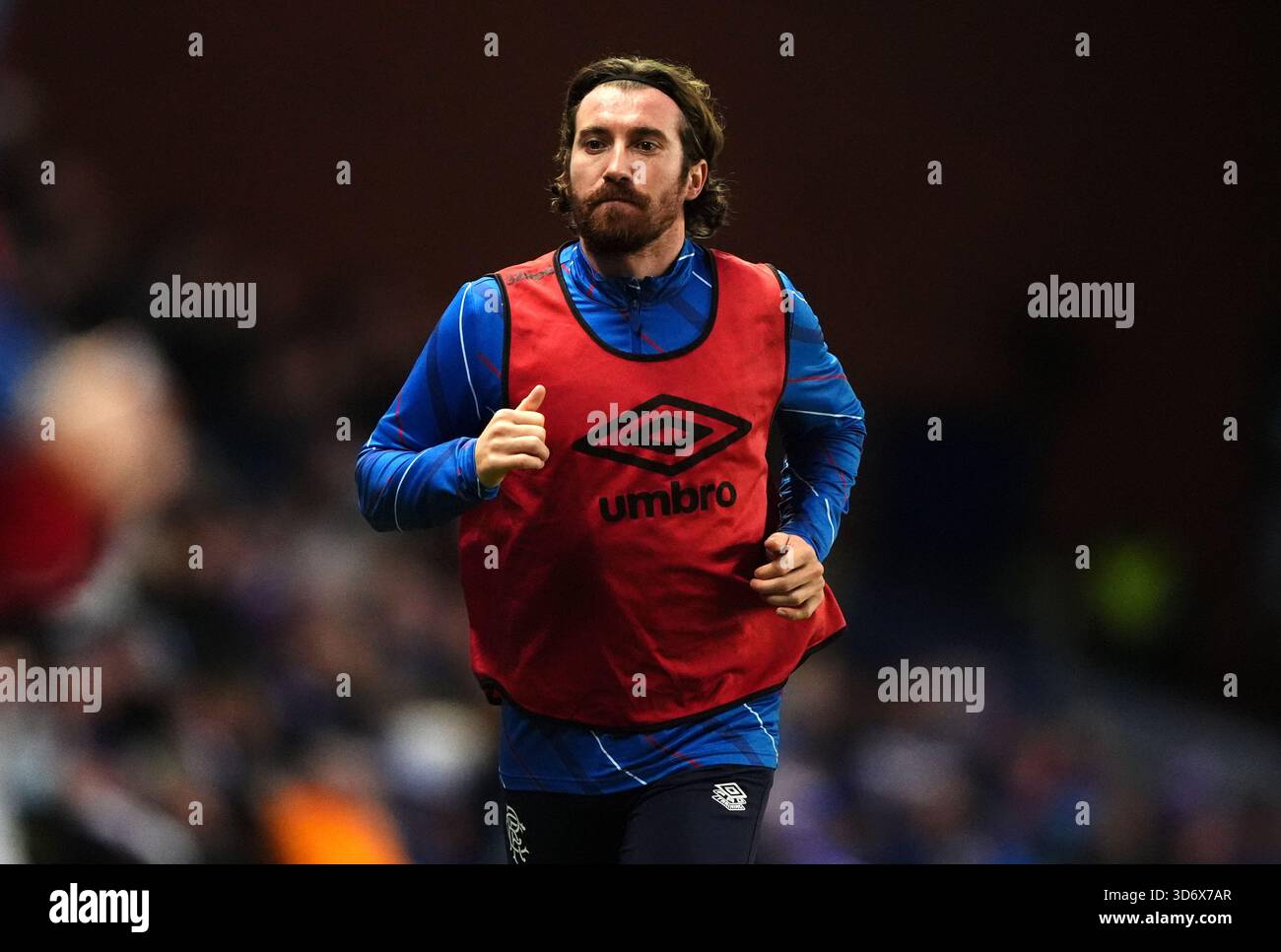 Rangers' Joe Rothwell warming up on the touchline during the William ...