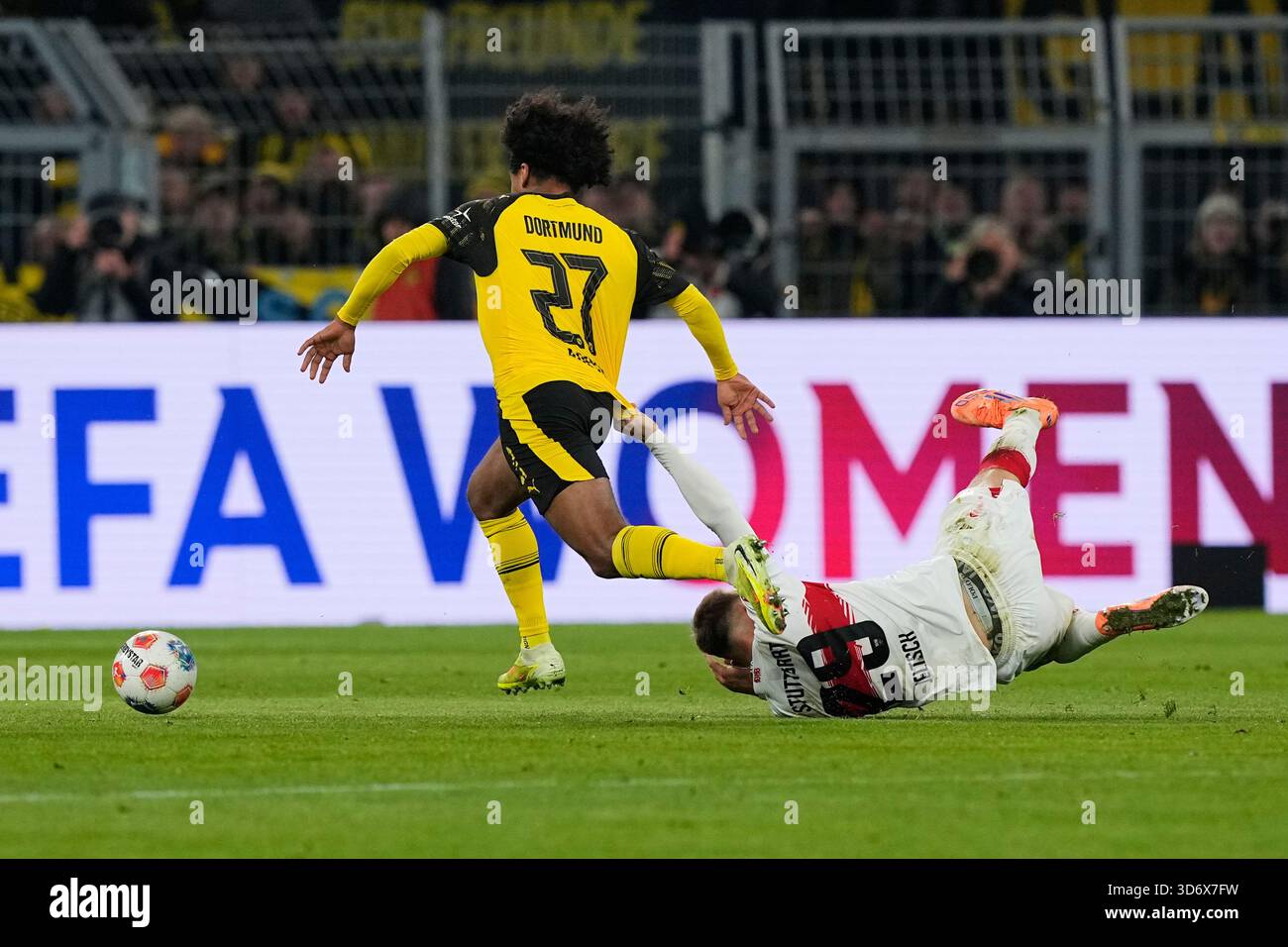 Dortmund's Karim Adeyemi is on his way to score his side's third goal ...