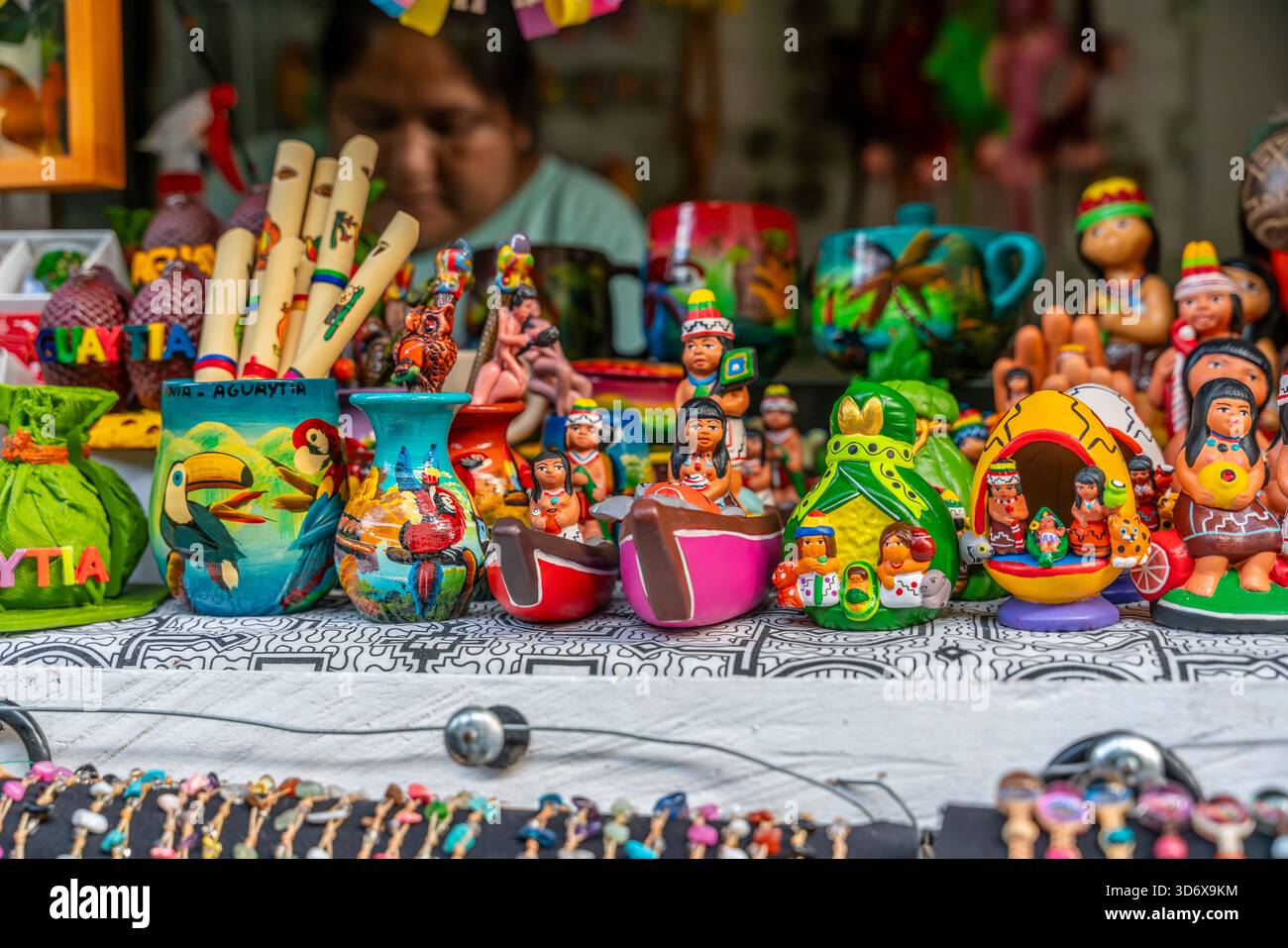 Colorful Amazonian handicrafts and ceramic figures representing ...