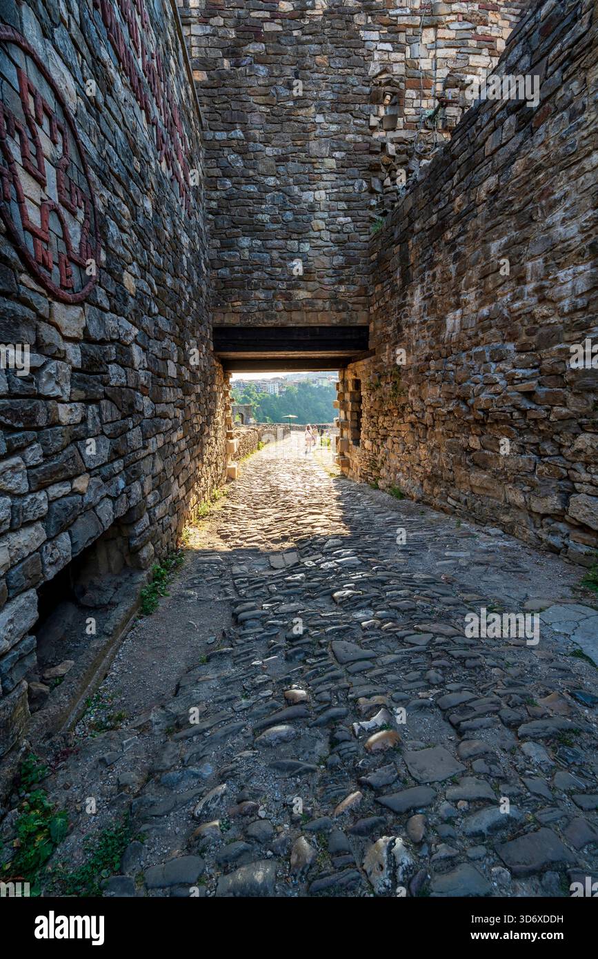 A medieval stone corridor inside Tsarevets Fortress in Veliko Tarnovo ...