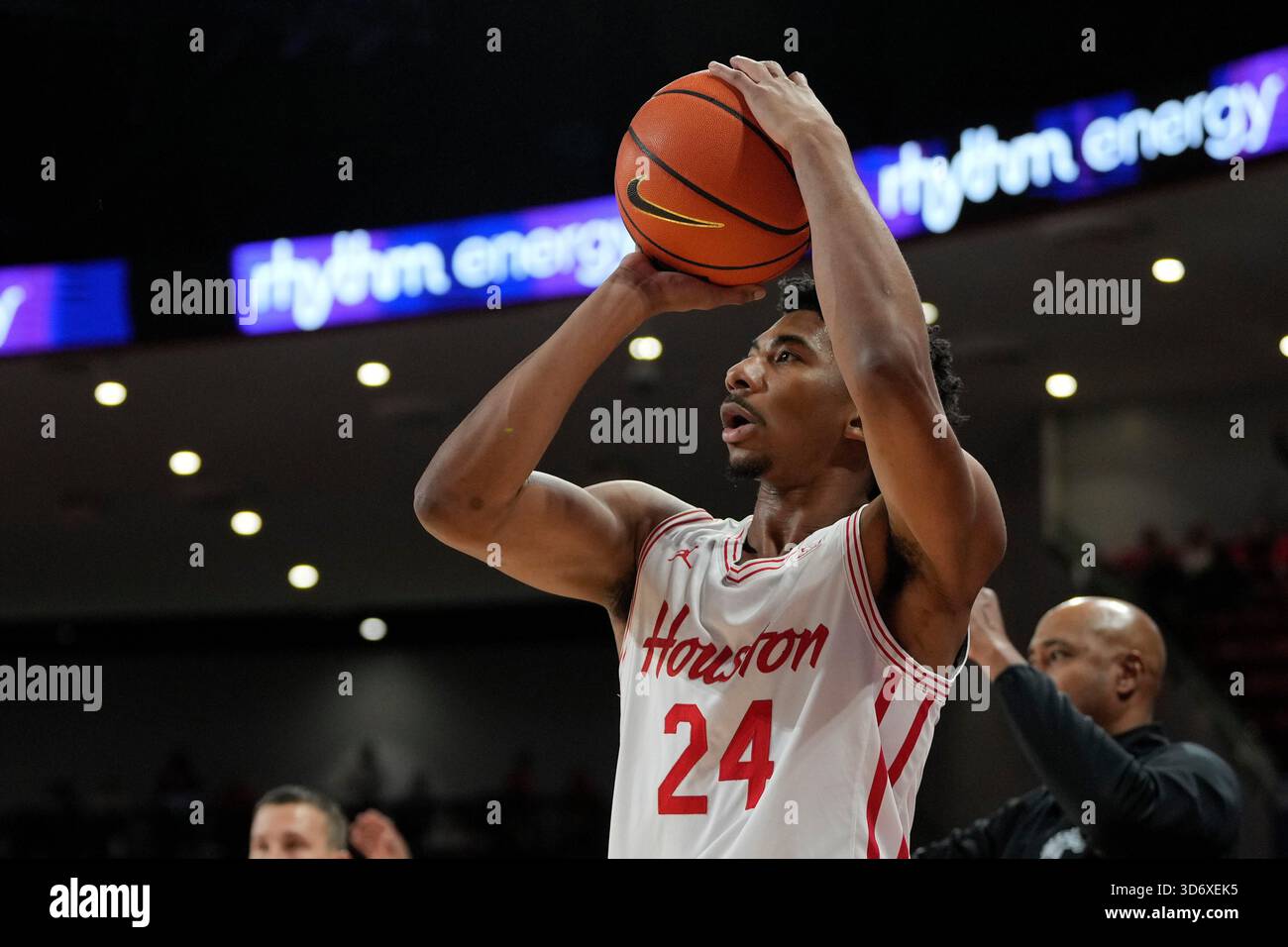 Houston forward Chase McCarty (24) shoots from three-point range during ...